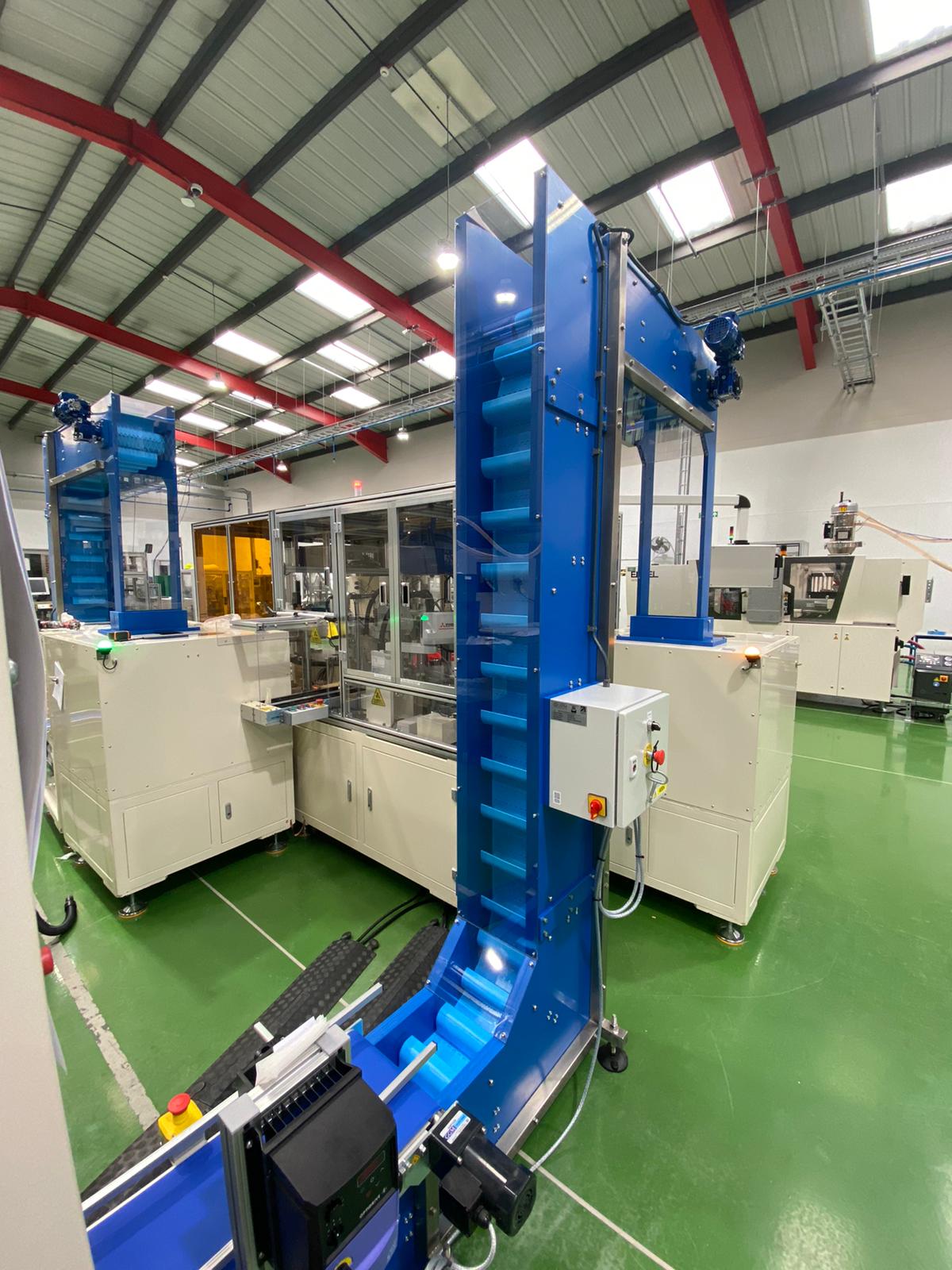 Vertical Conveyor System Case Study | UPM Conveyors